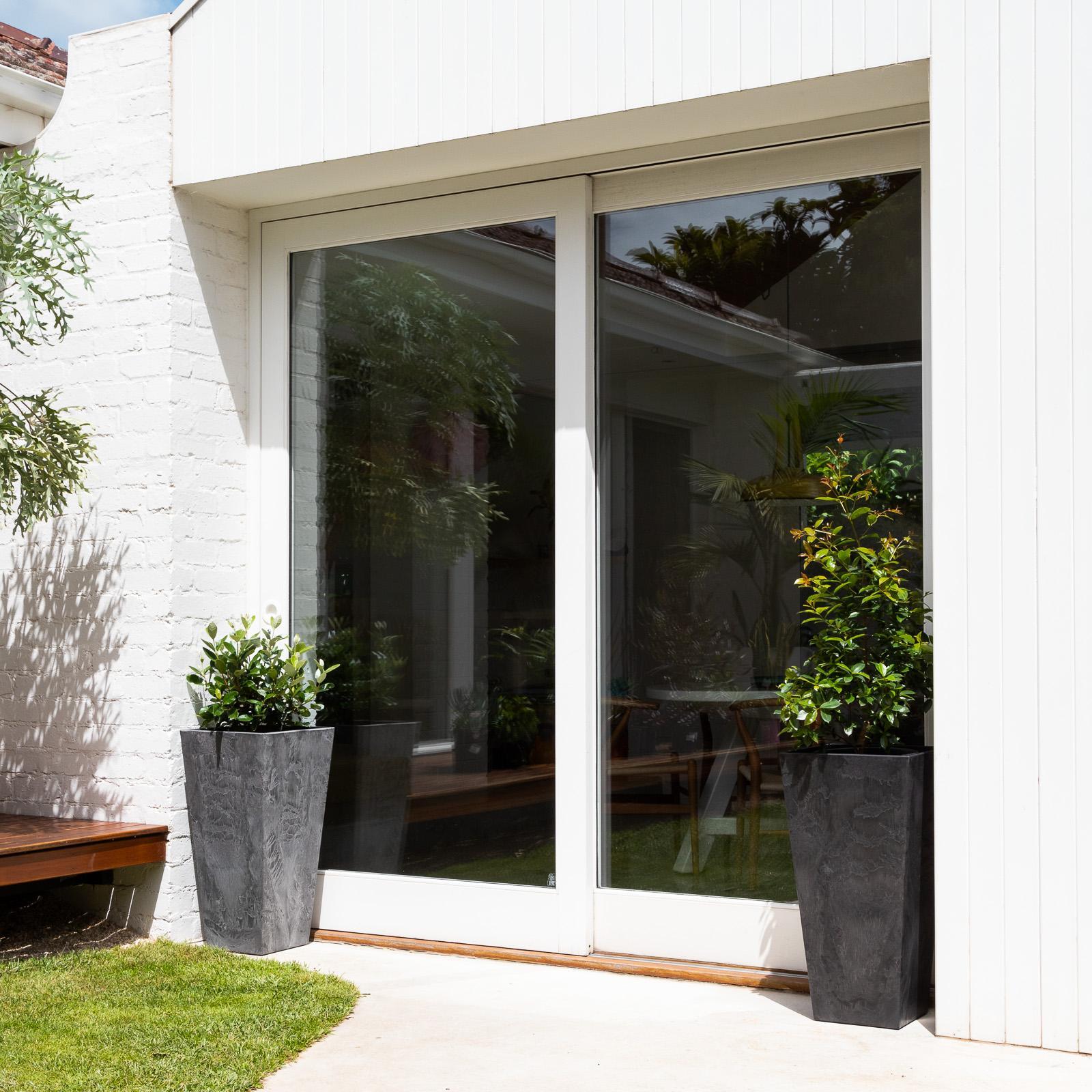 Tuscan Path 70cm Black Stone Art Ella Vase Pot - Bunnings Australia