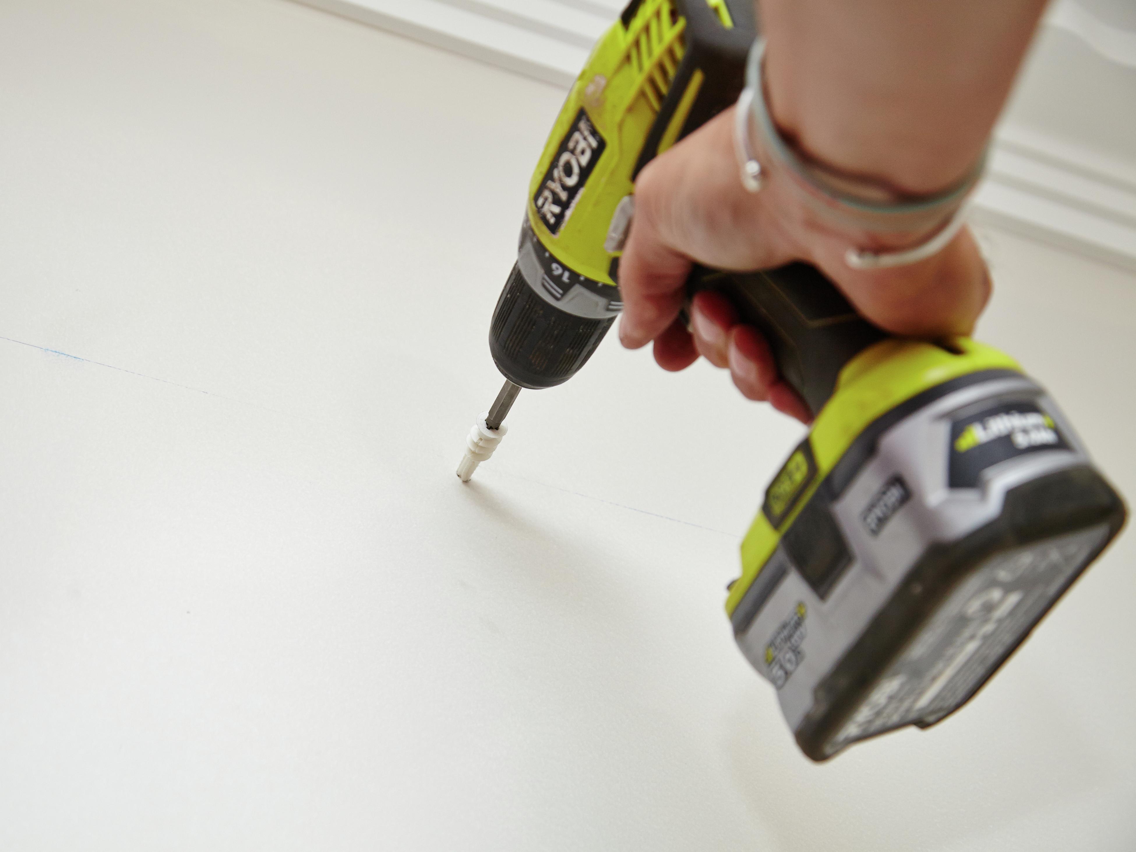 How To Hang a Picture Frame From a Track - Bunnings Australia